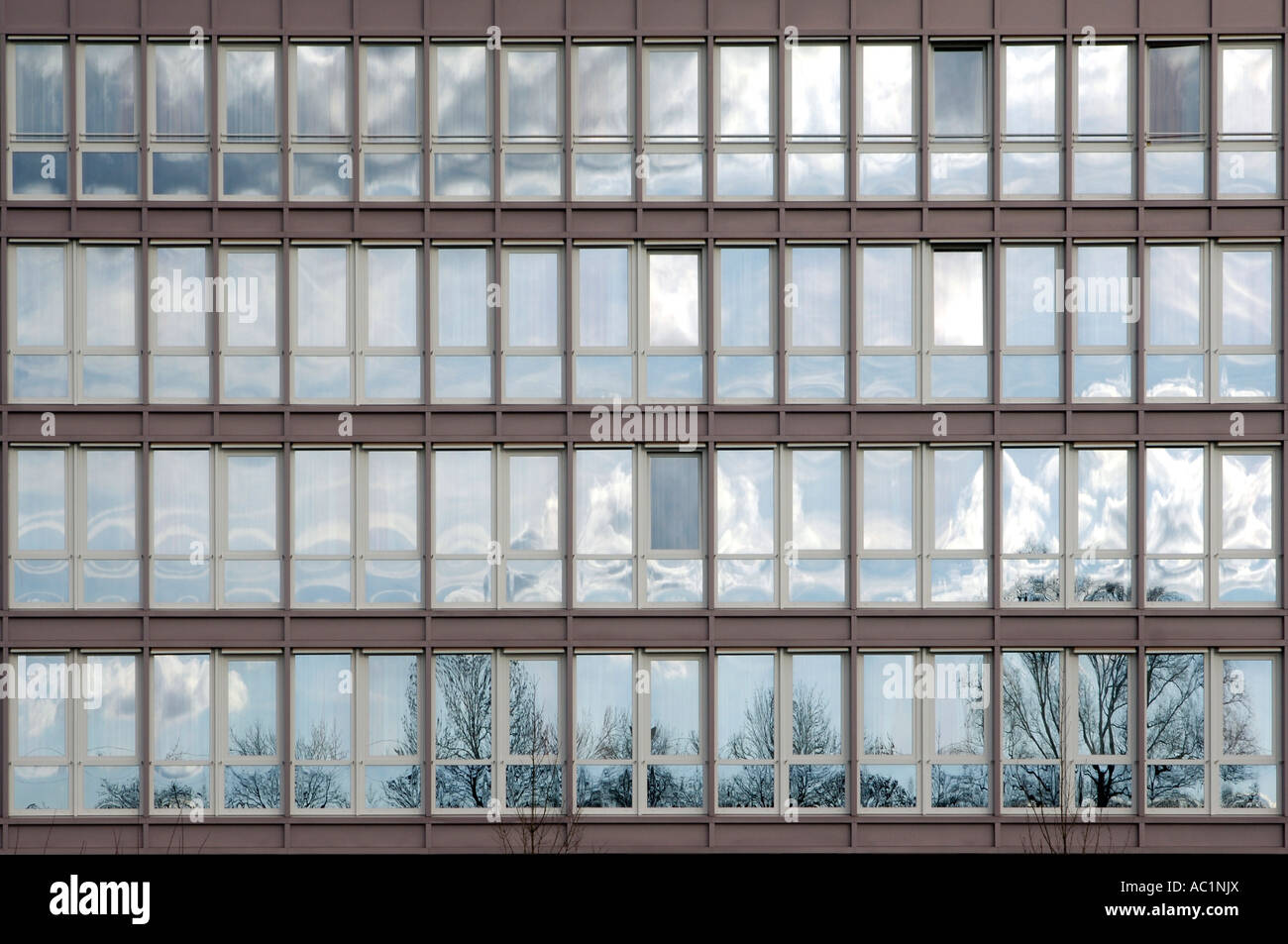 Office building, glass front, reflections Stock Photo - Alamy