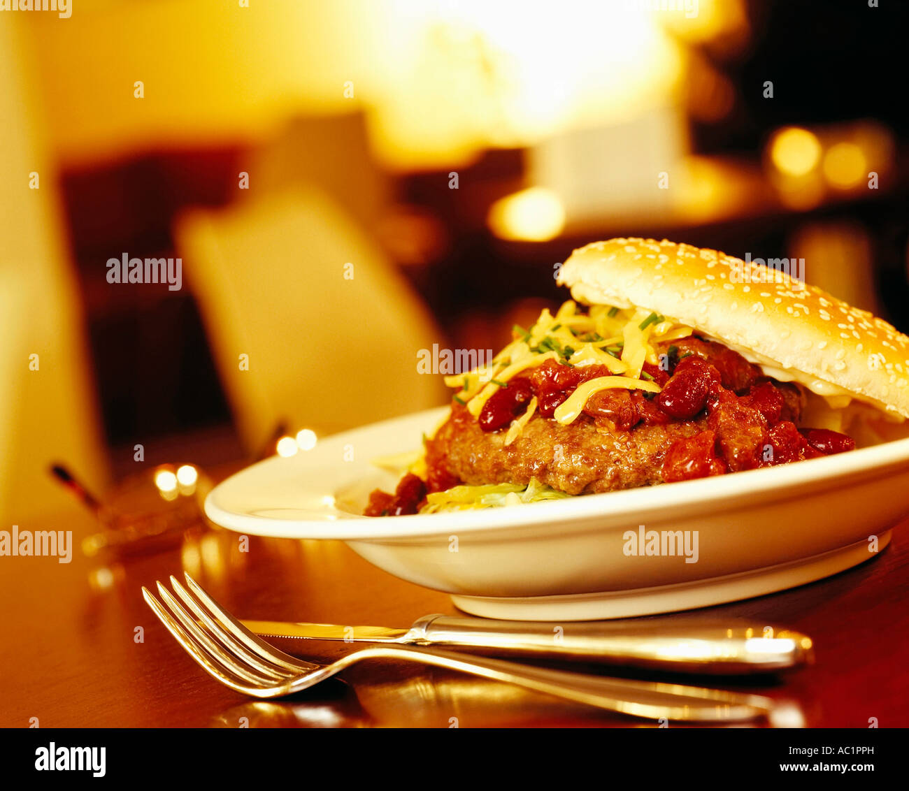 Hamburger on plate, close-up Stock Photo - Alamy
