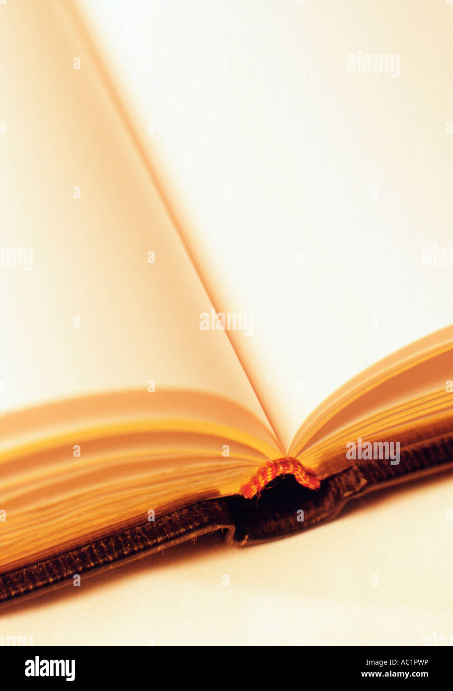 Opened book, detail Stock Photo - Alamy