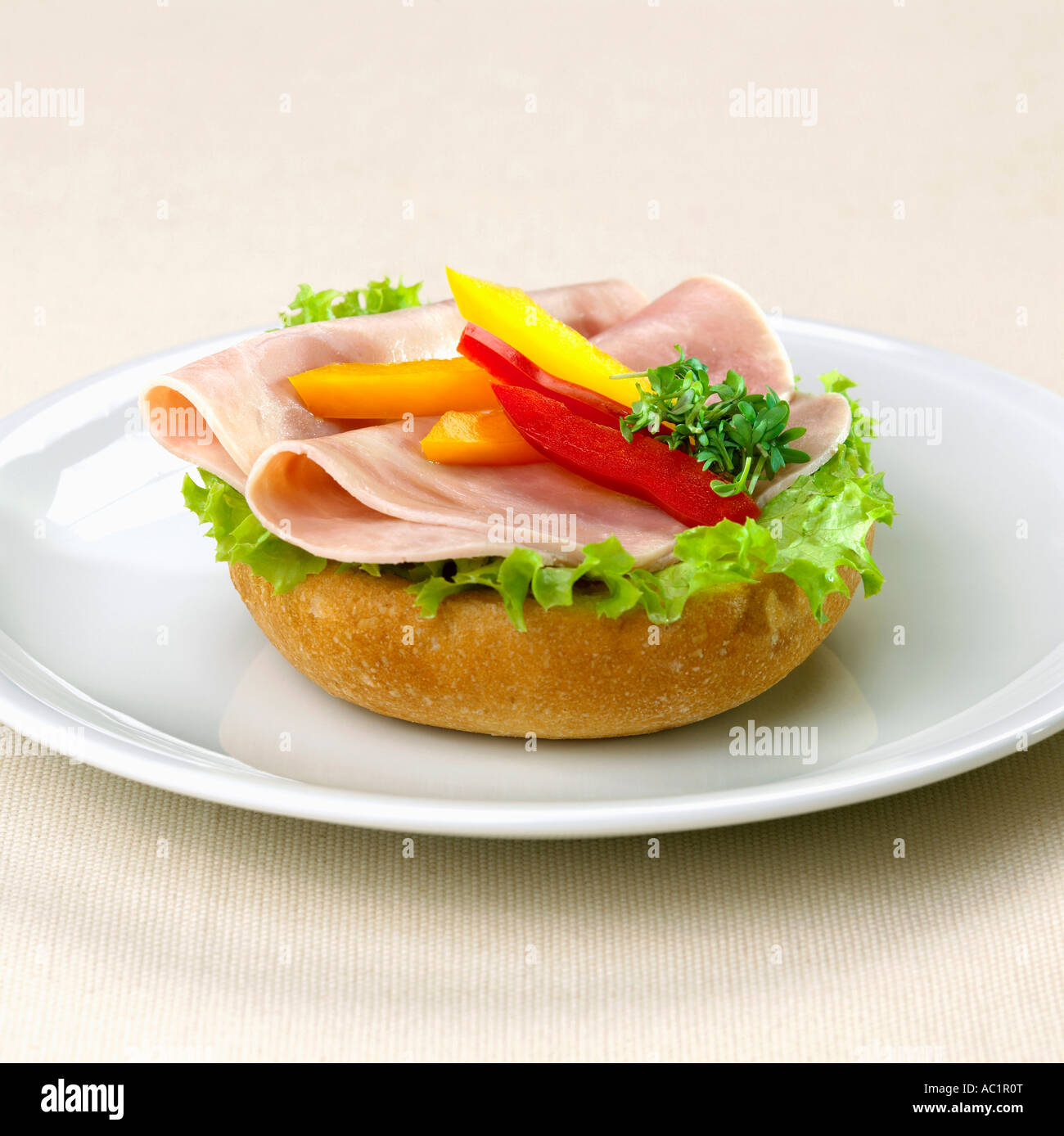Roll with ham Stock Photo - Alamy