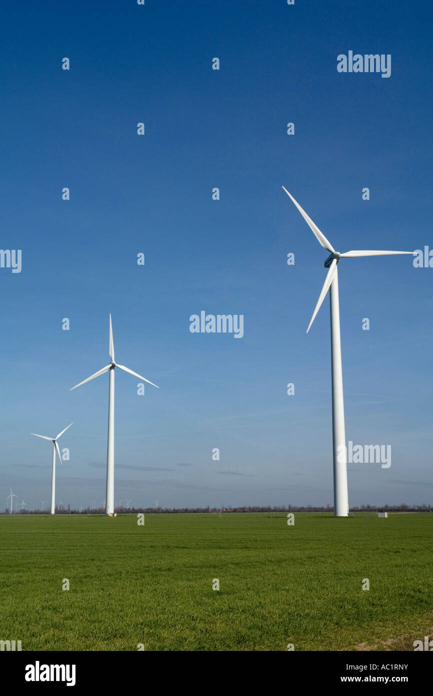 Germany, wind wheels in field Stock Photo - Alamy