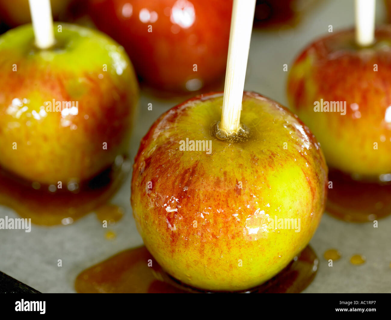 home made toffee apples drying on grease proof paper Stock Photo - Alamy