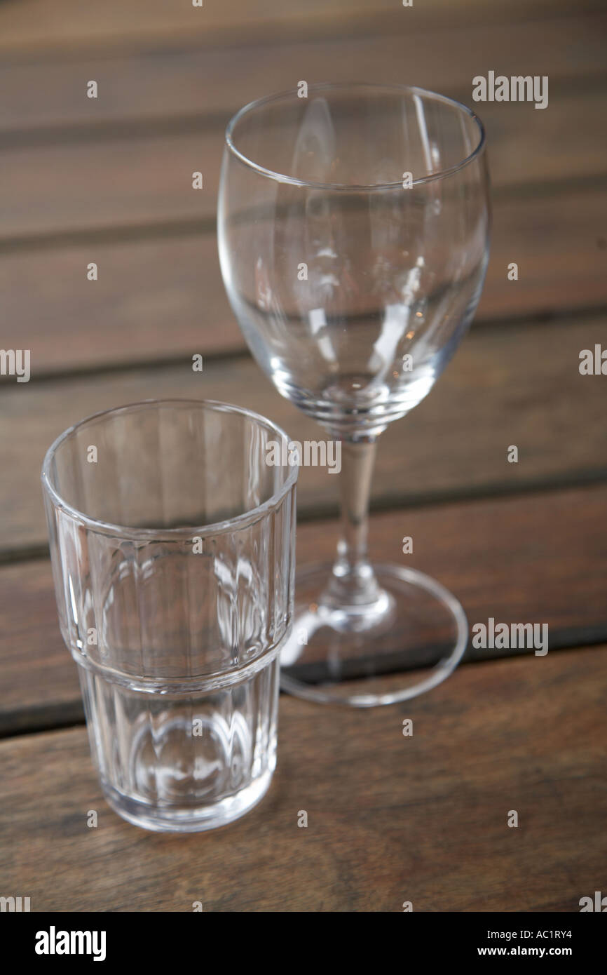 two types of cafe glasses on rustic table Stock Photo - Alamy