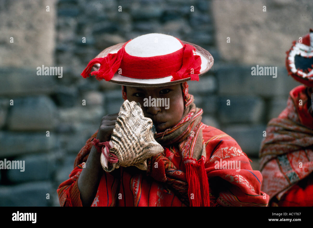 Quechua Peruvian man blowing concha shell Patacancha Peru Stock Photo ...