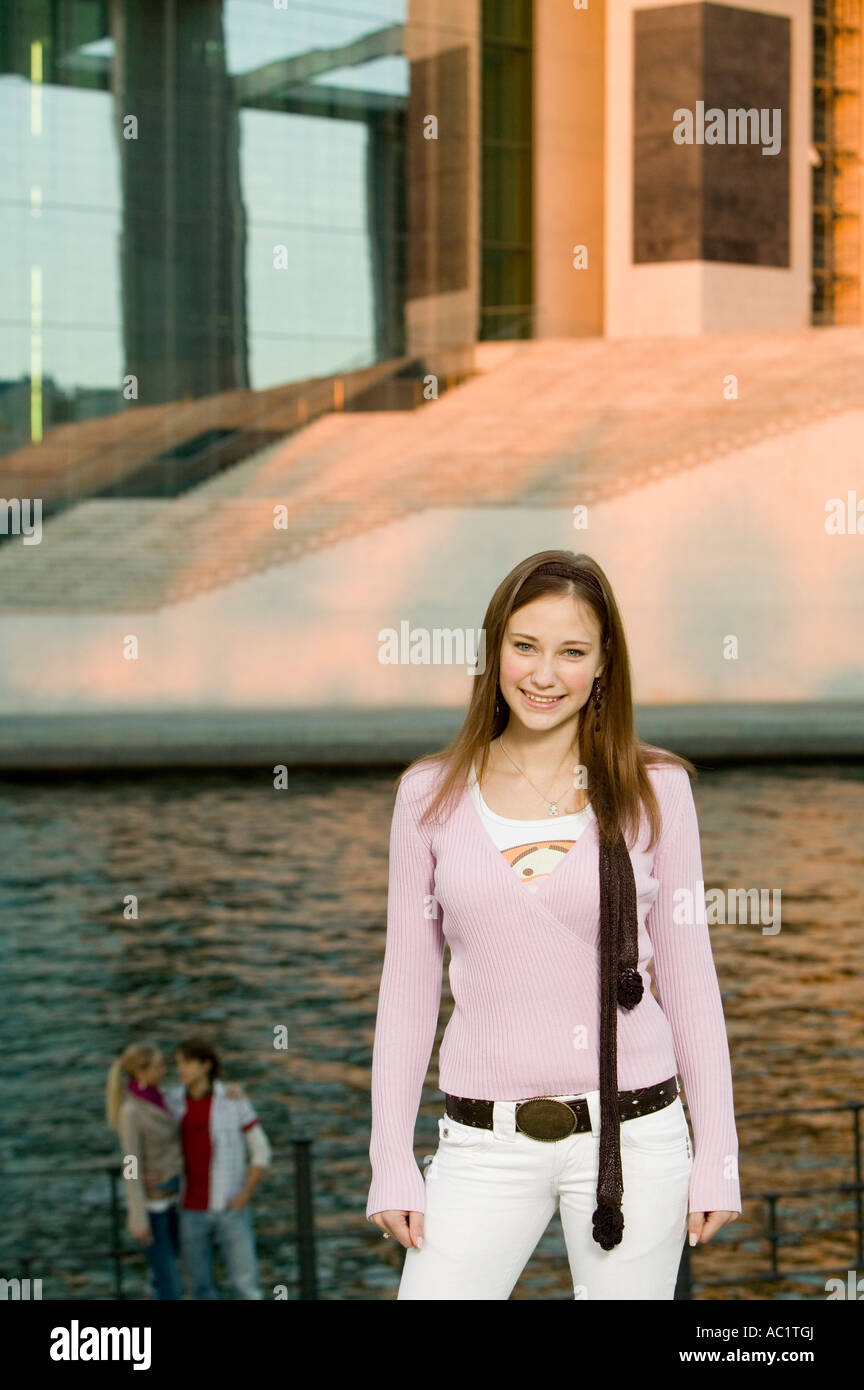 Young woman at river, portrait Stock Photo - Alamy
