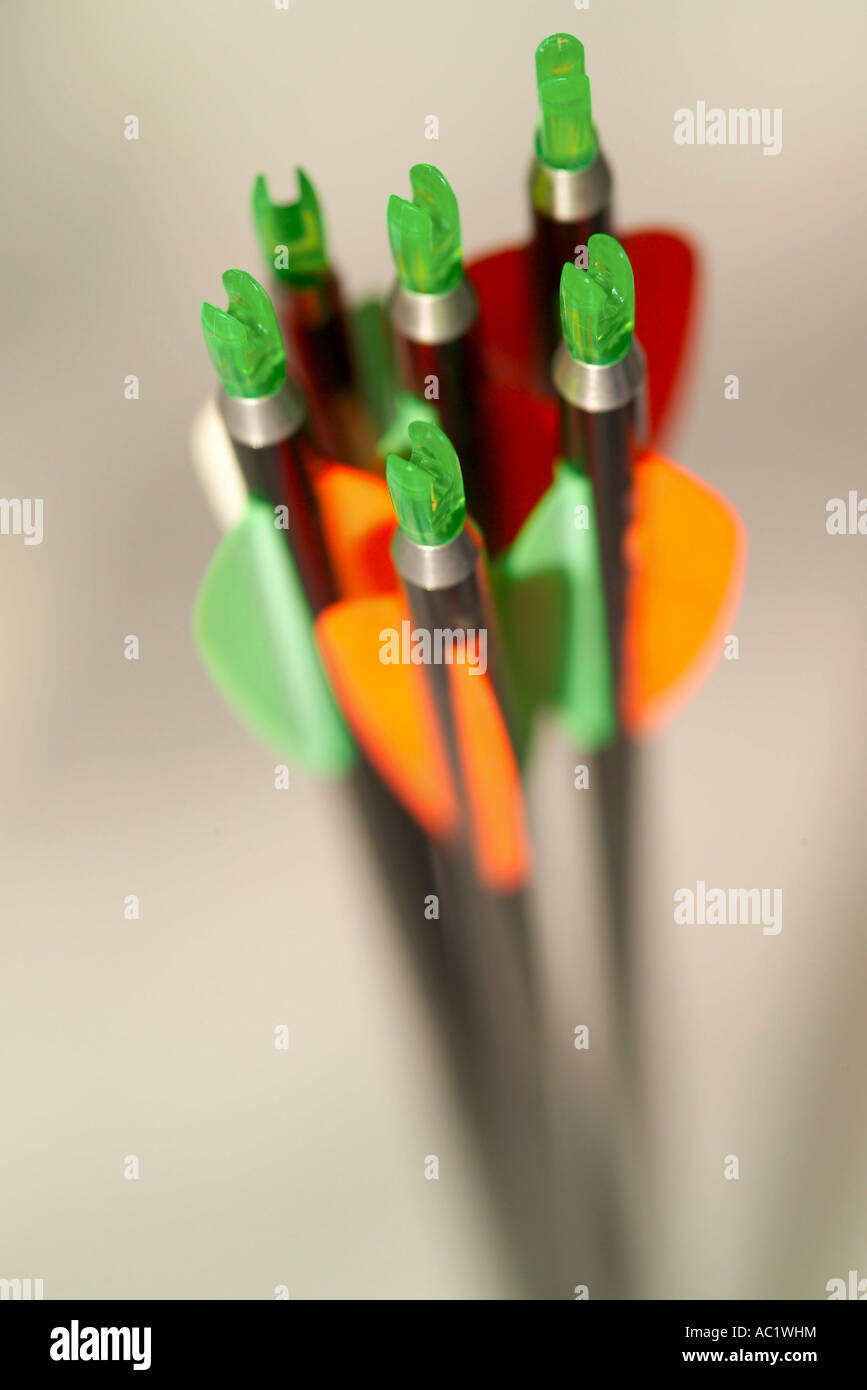 Arrows in target Stock Photo - Alamy