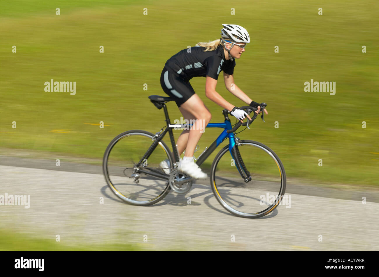 Racing cyclist on the way Stock Photo - Alamy