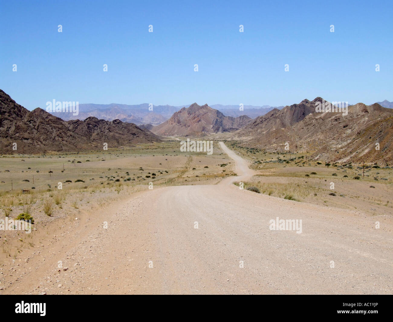 Empty dirt track Stock Photo - Alamy