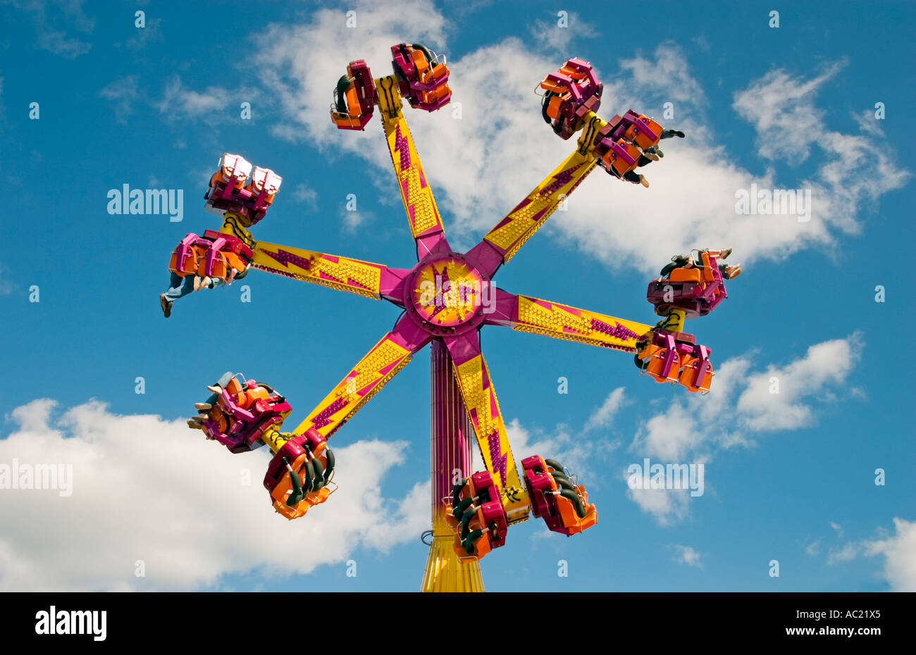 Rotating fun scary fairground ride Stock Photo - Alamy