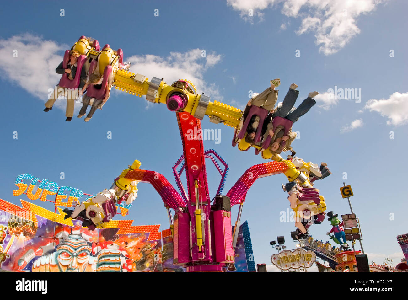 Rotating fun scary fairground ride Stock Photo - Alamy