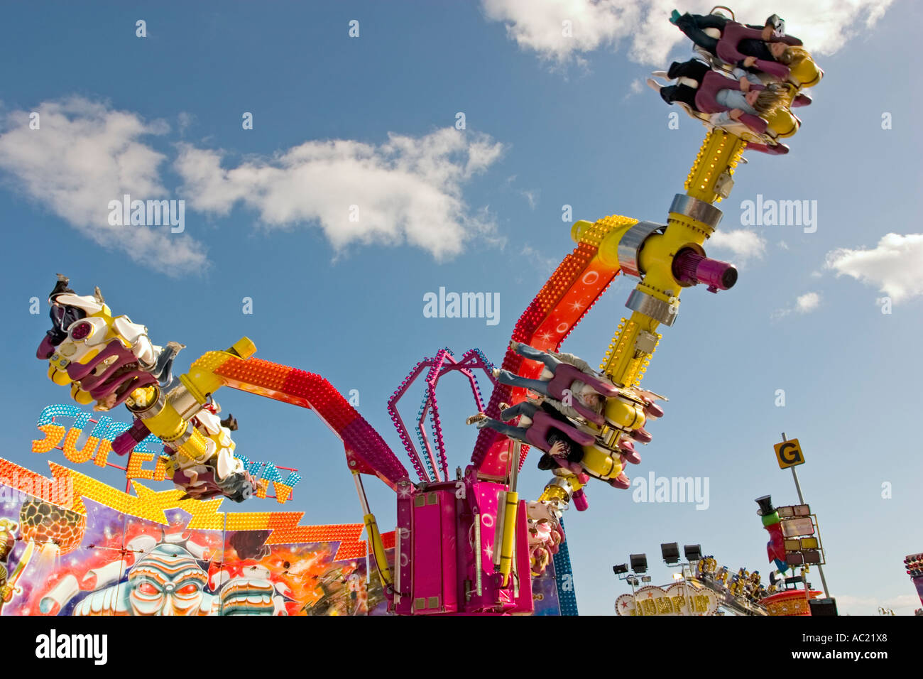 Rotating fun scary fairground ride Stock Photo - Alamy