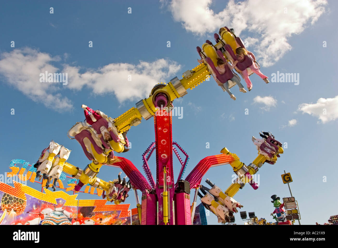 Rotating fun scary fairground ride Stock Photo - Alamy