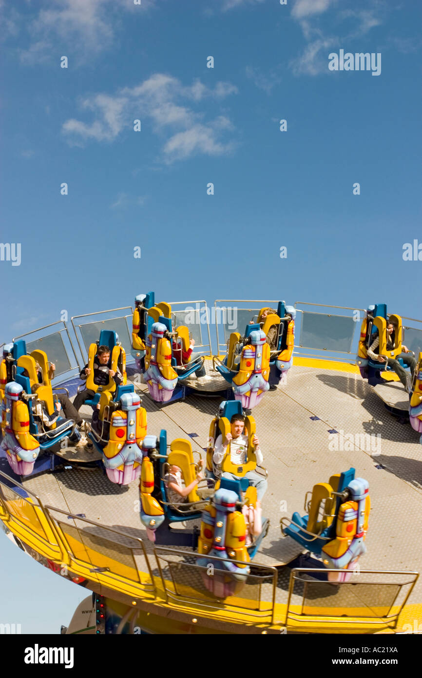 Rotating fun scary fairground ride Stock Photo - Alamy