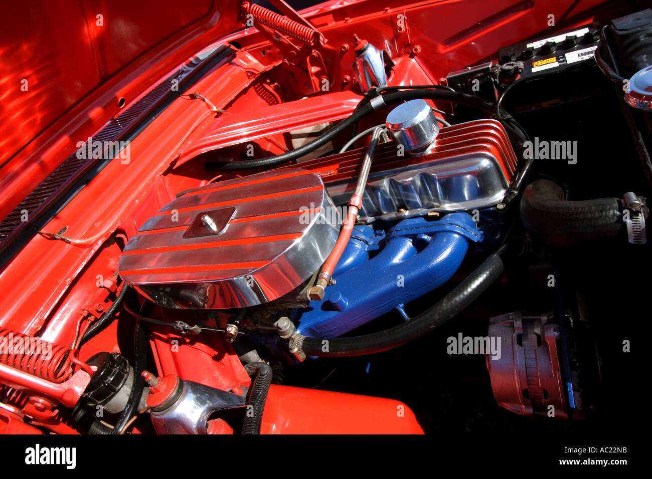 HOT ROD MOTOR IN RED CAR HORIZONTAL BAPDB7895 Stock Photo - Alamy