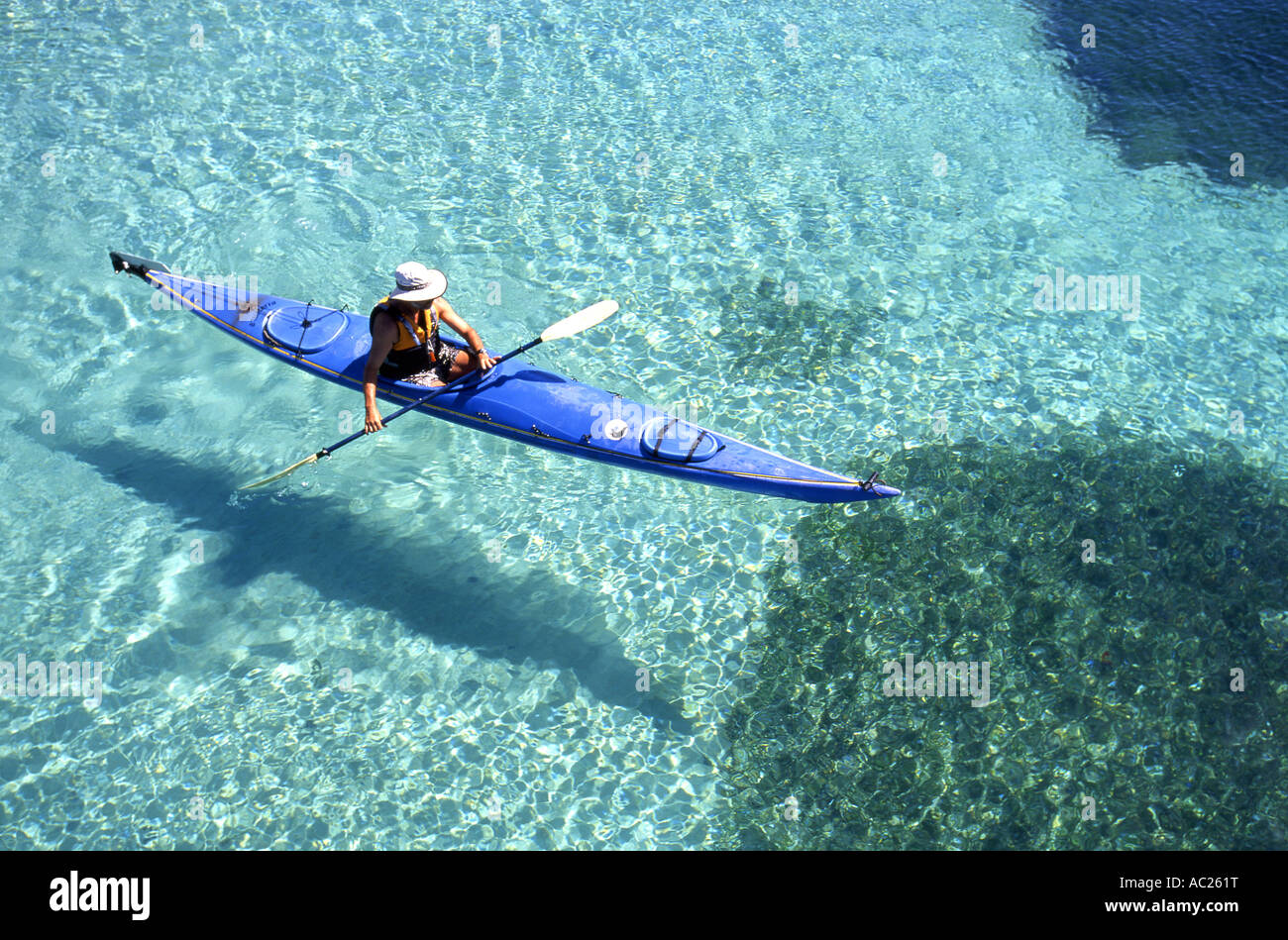 Man kayaking in body of water Stock Photo - Alamy