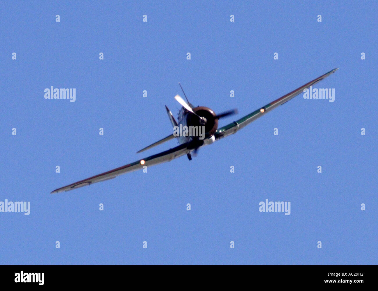 SINGLE FIGHTER PLANE FLYING OVER ANZAC DAY PARADE HORIZONTAL BAPDA7604 ...
