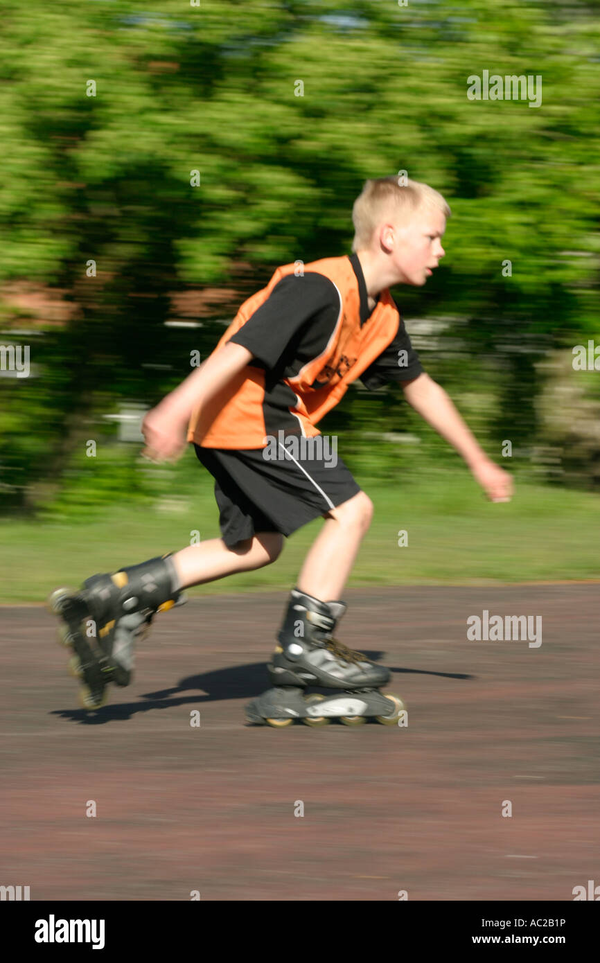 young boy skating Stock Photo - Alamy
