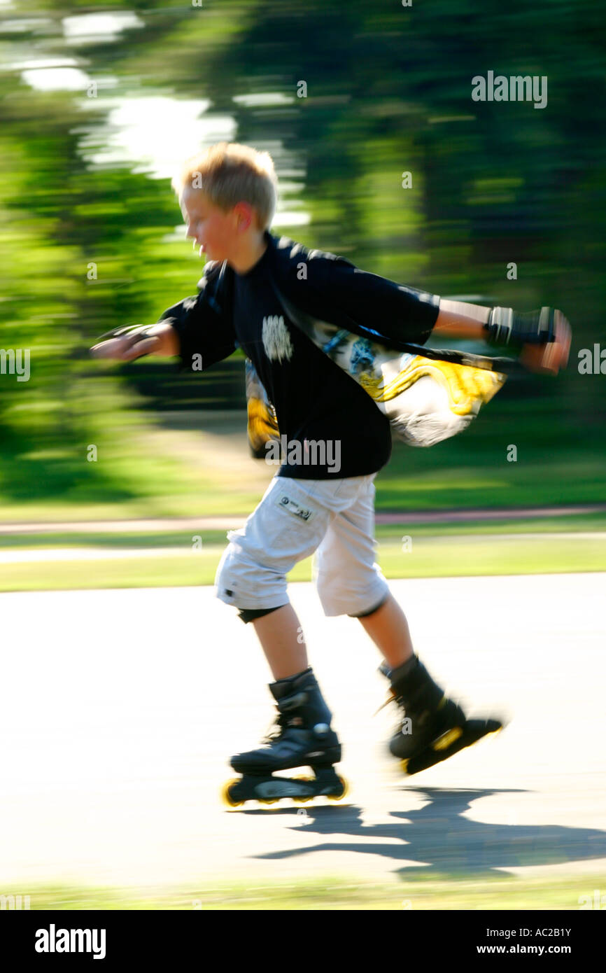 young boy skating Stock Photo - Alamy