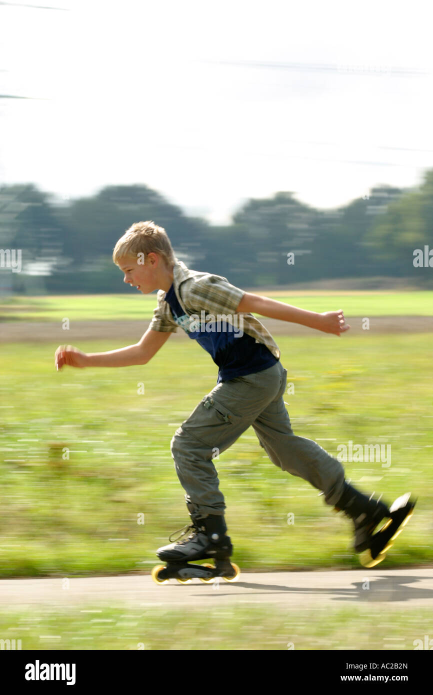 young boy skating Stock Photo - Alamy