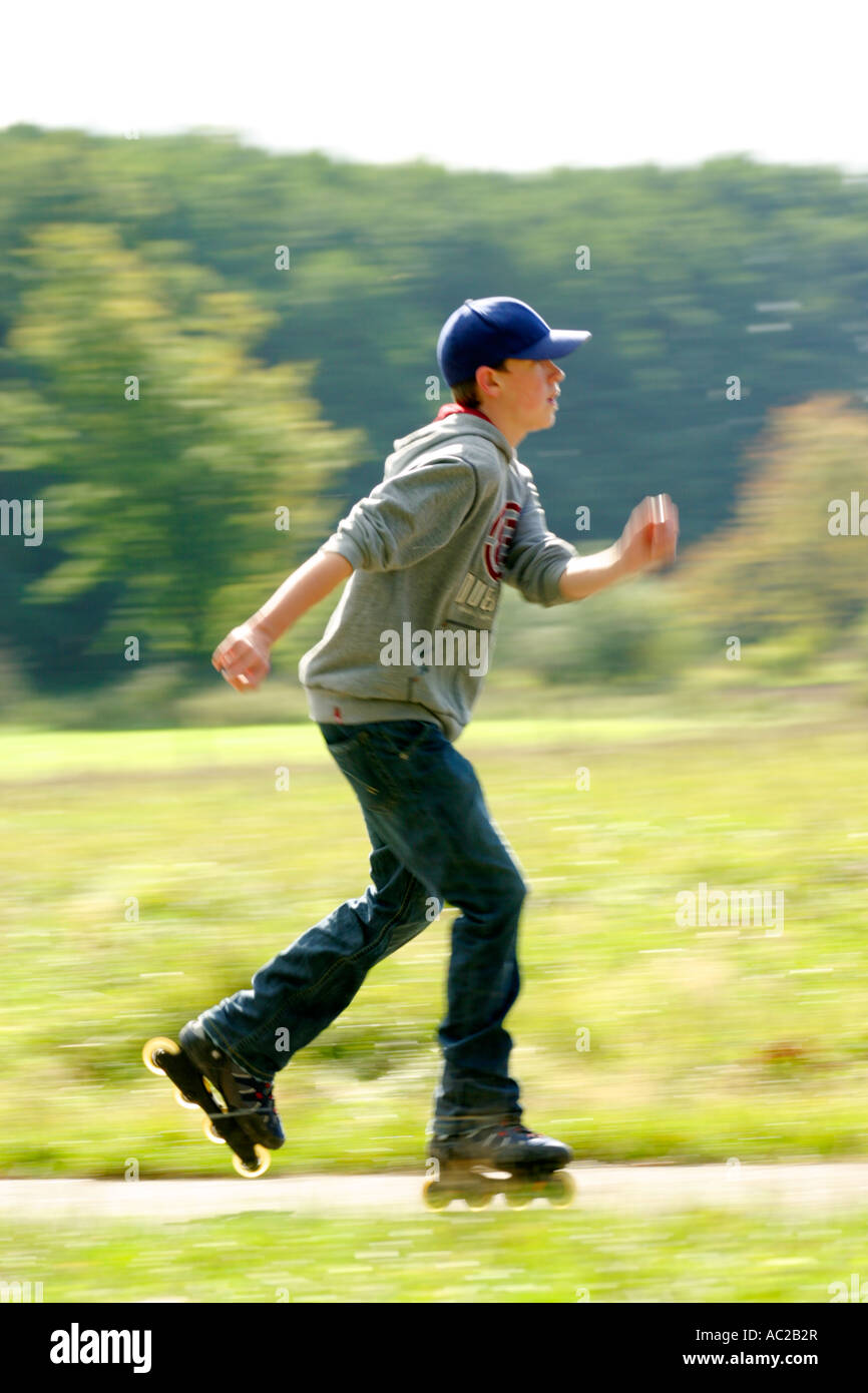 young boy skating Stock Photo - Alamy