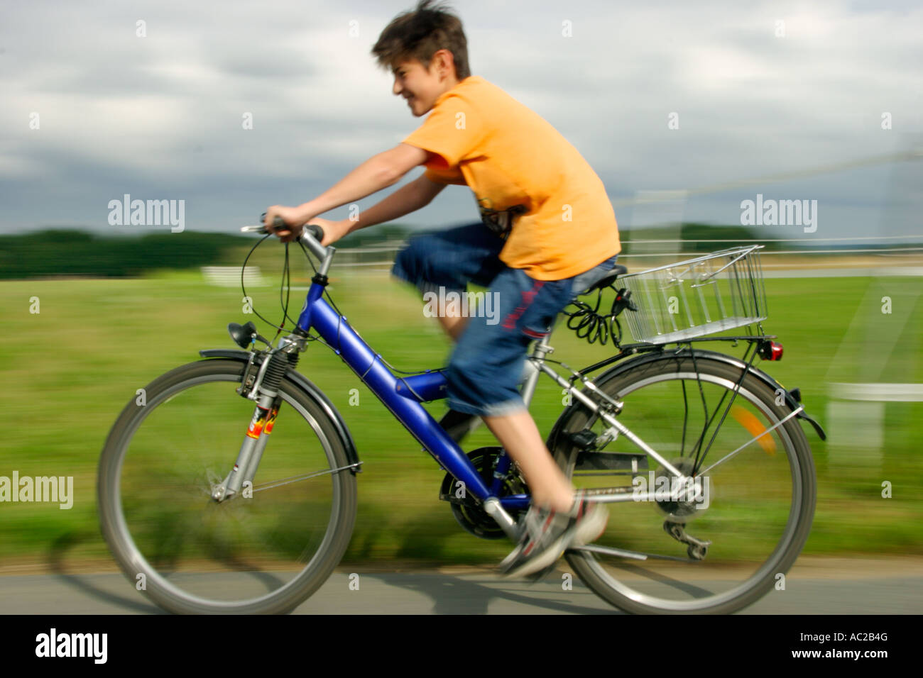 Black boys on bike hi-res stock photography and images - Alamy