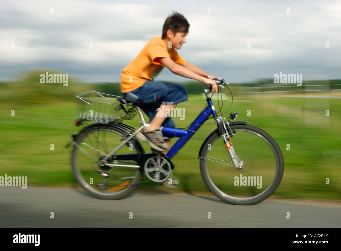 young boy on a bike Stock Photo - Alamy