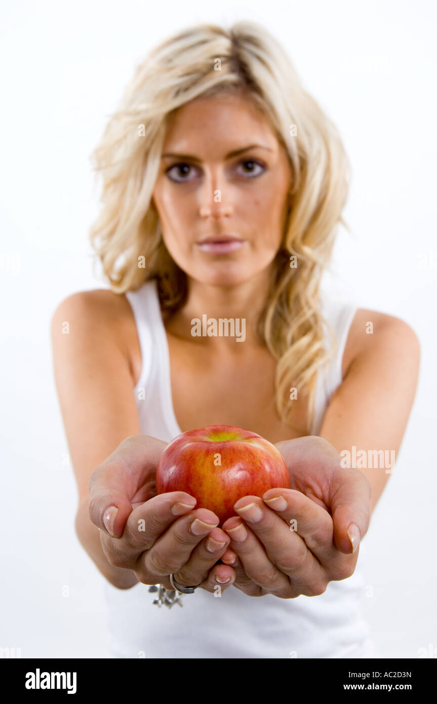 woman holding an apple Stock Photo - Alamy