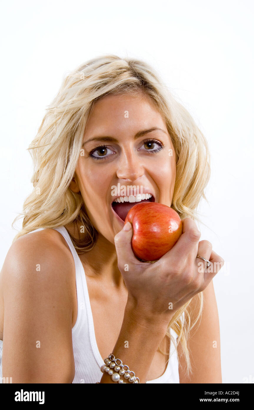 woman eating an apple Stock Photo - Alamy
