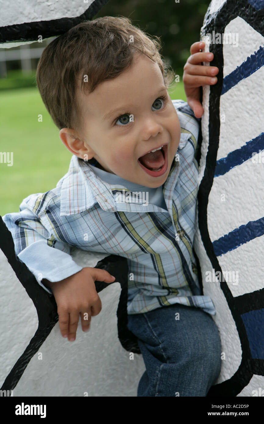 A boy playing in the park Stock Photo - Alamy