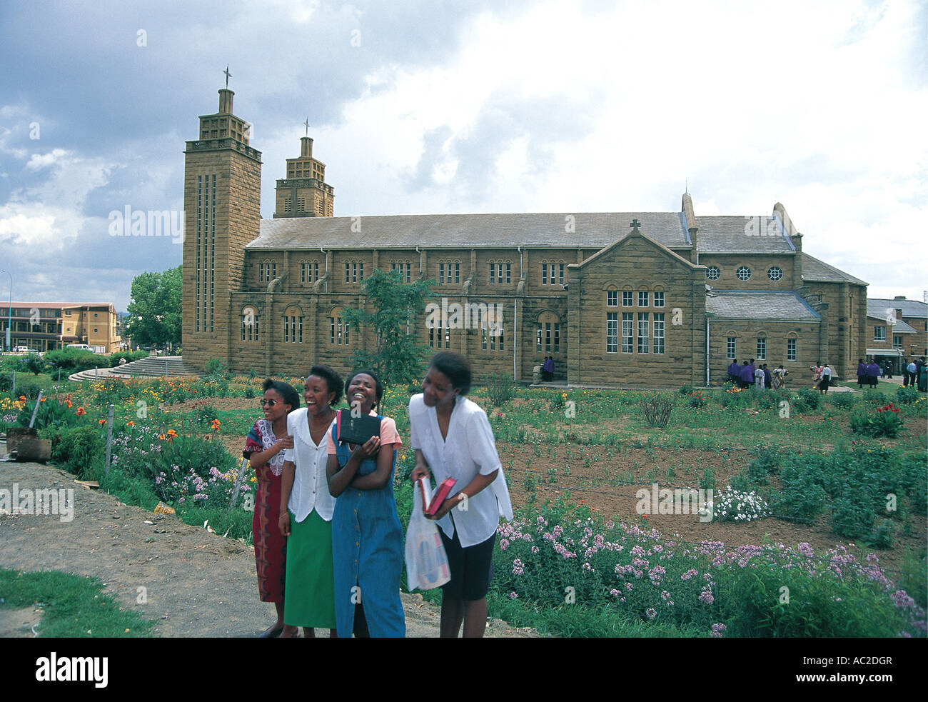 Church goers outside their church happy after services Maseru capital ...