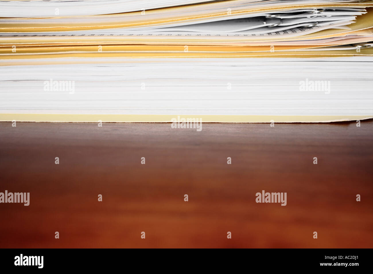 Stack Of Documents On Office Desk Stock Photo - Alamy