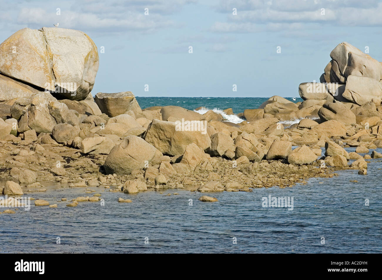 sea Atlantic Ocean with granit rocks at the coast in Finistere Brittany ...