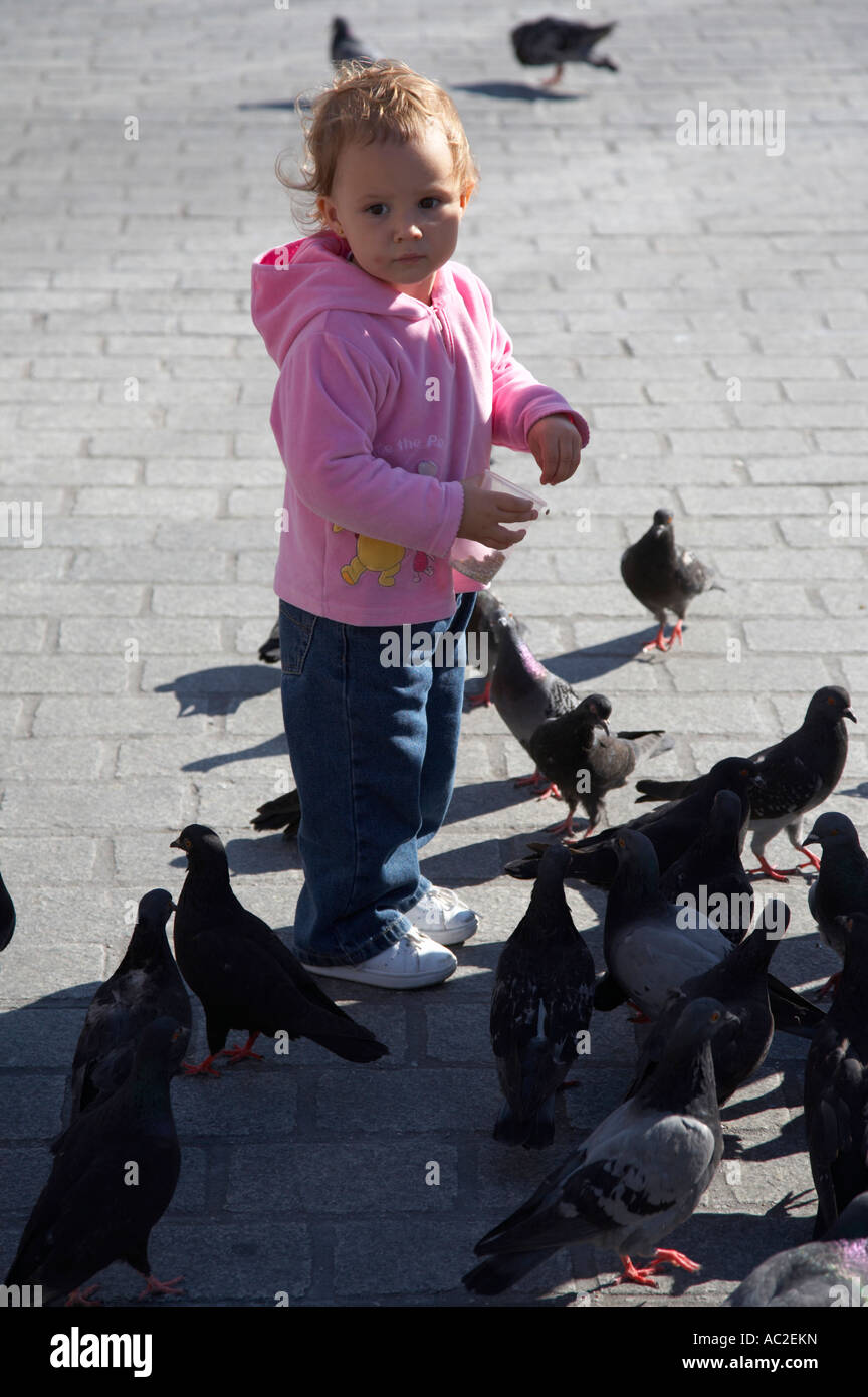 Rynek children pigeon hi-res stock photography and images - Alamy