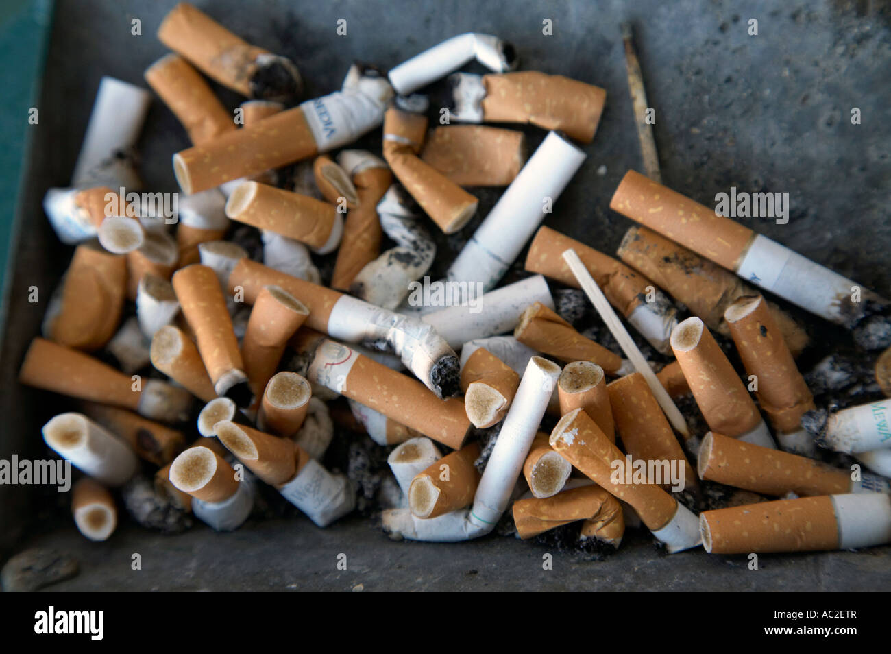 Pile Used Cigarette Butts High Resolution Stock Photography and Images ...