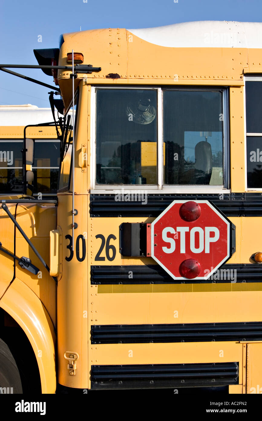 Stock photo of a school bus and blue sky above Stock Photo - Alamy