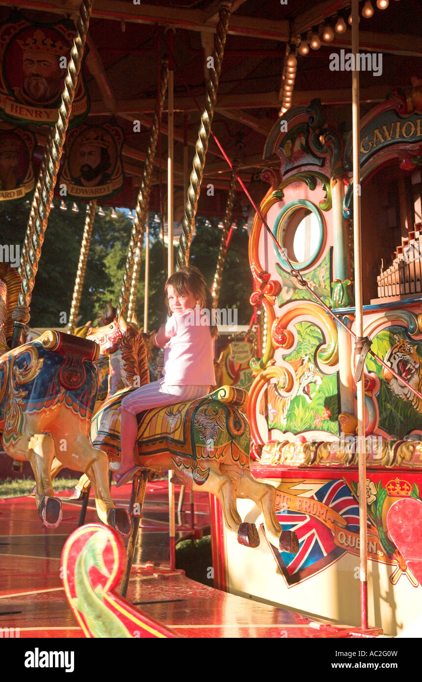Young girl on a carousel Stock Photo - Alamy