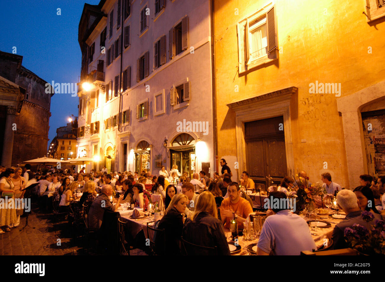 People eating at restaurant beside the Pantheon at night Rome Italy ...