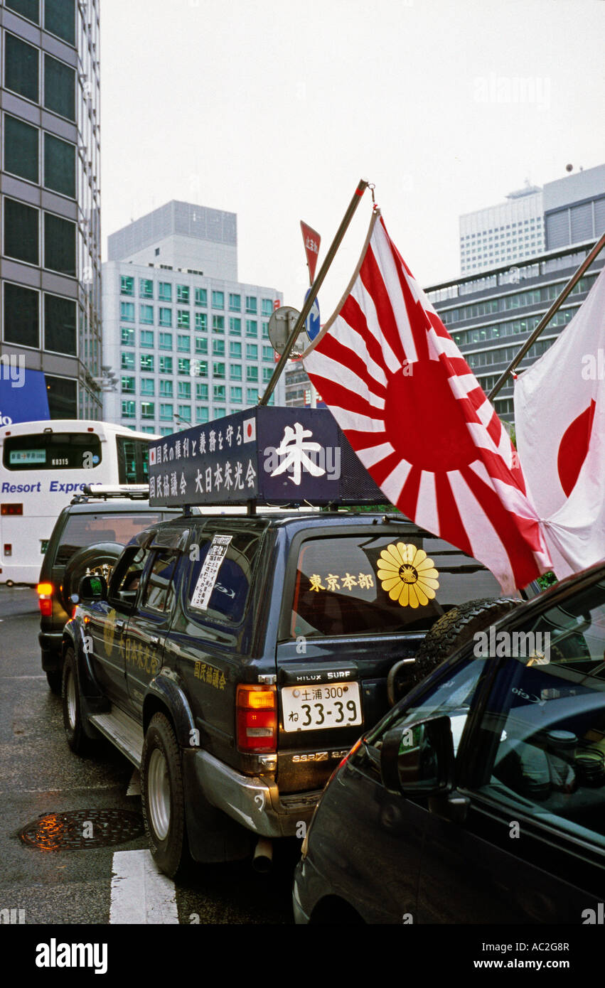 Right-wing Uyoku Dantai during a rally in the rain outside Shinjuku ...
