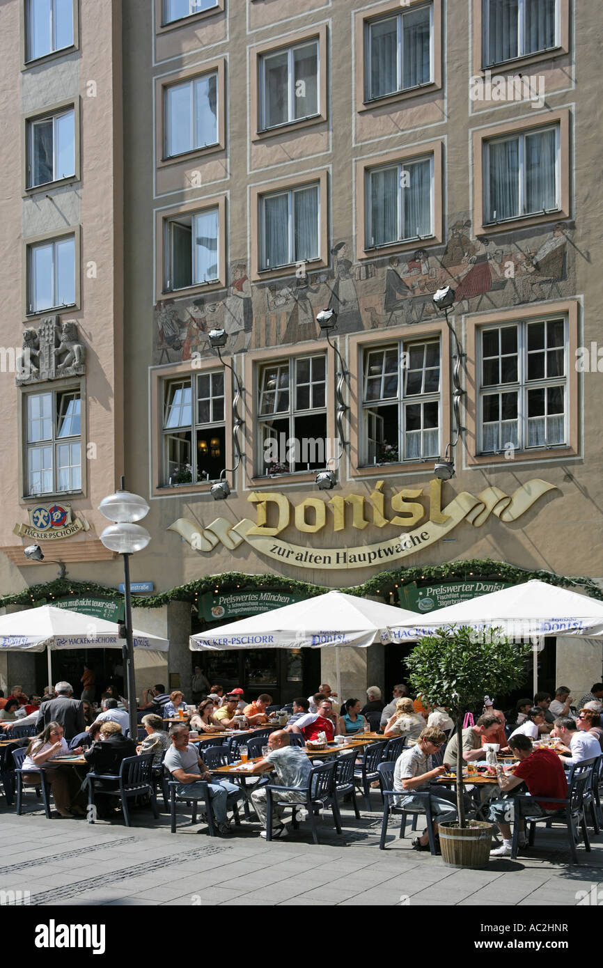 Germany Bavaria Munich People sitting outside the popular Donisl ...