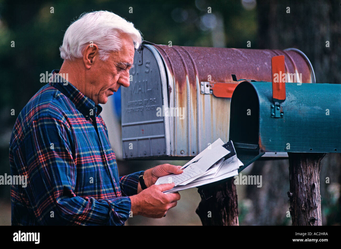 Man opening mailbox hi-res stock photography and images - Alamy
