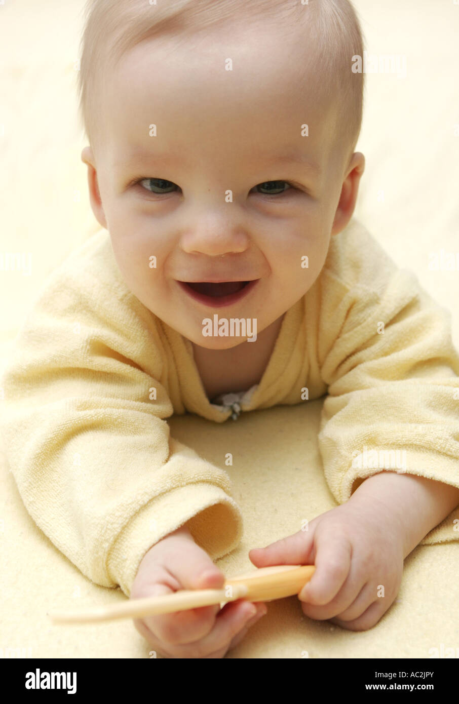 Portrait of baby with comb Stock Photo - Alamy