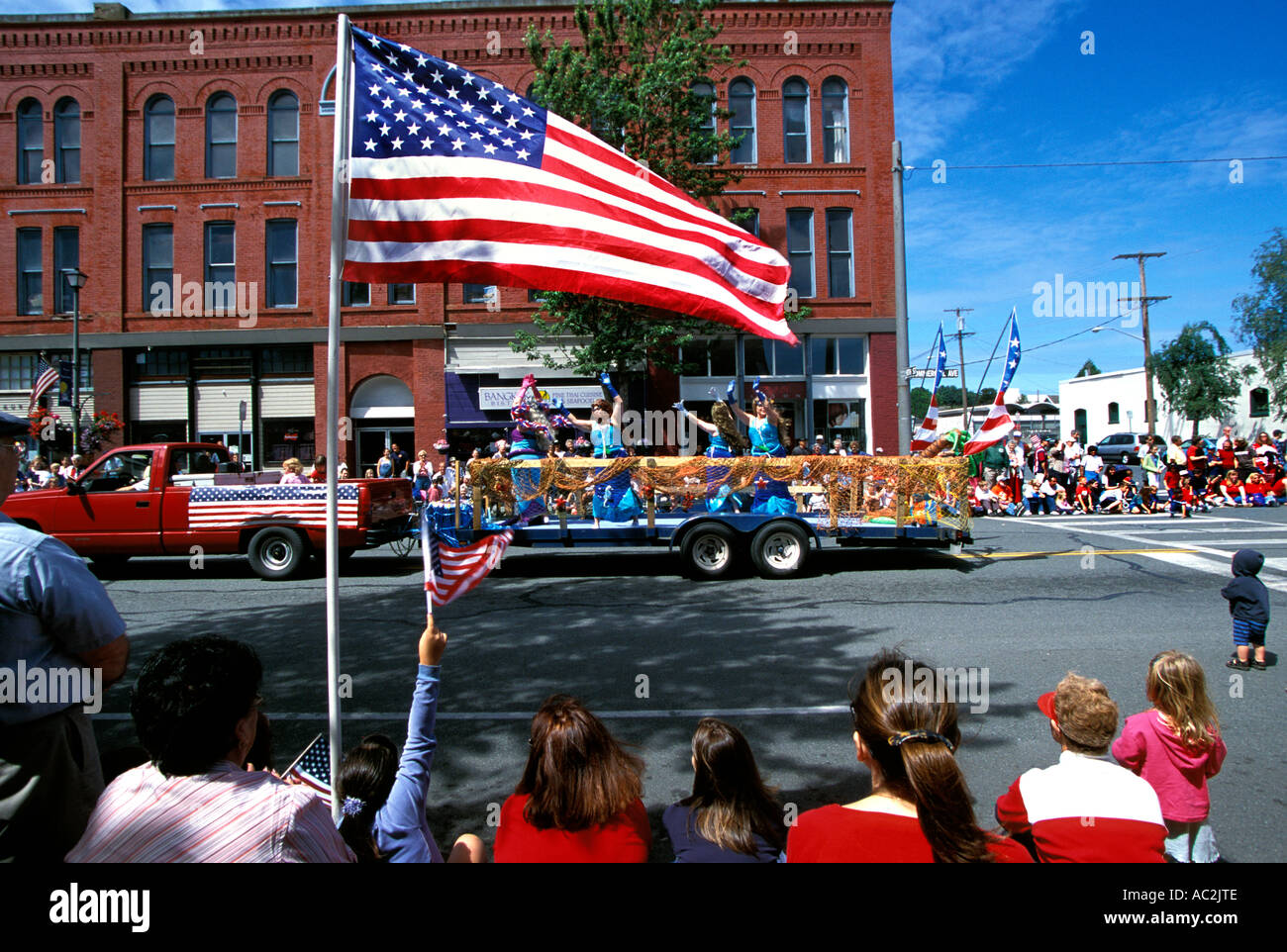 Spectators Watching July 4th Parade Stock Photo - Alamy