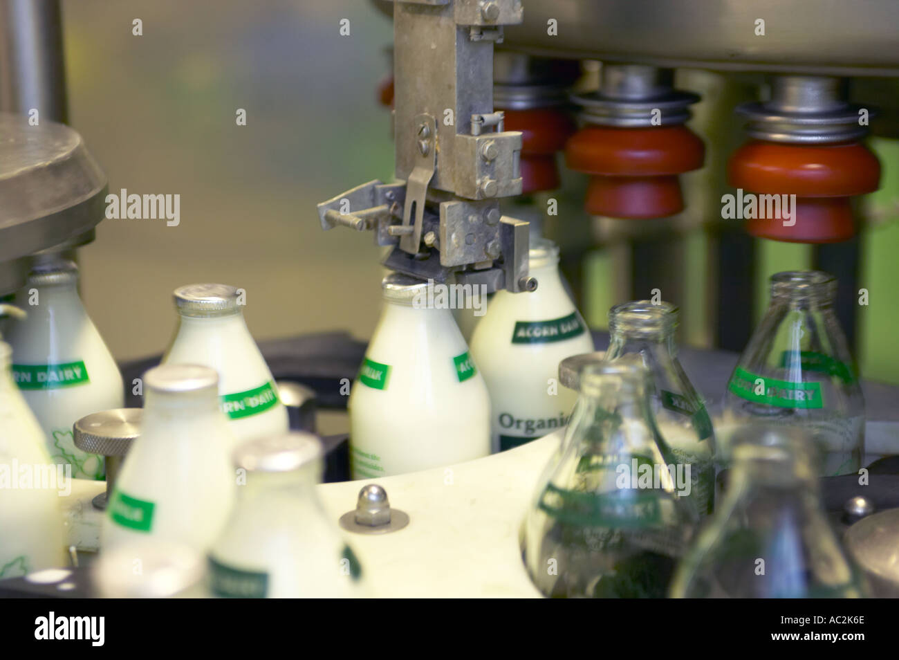 Milk bottle top machine hi-res stock photography and images - Alamy
