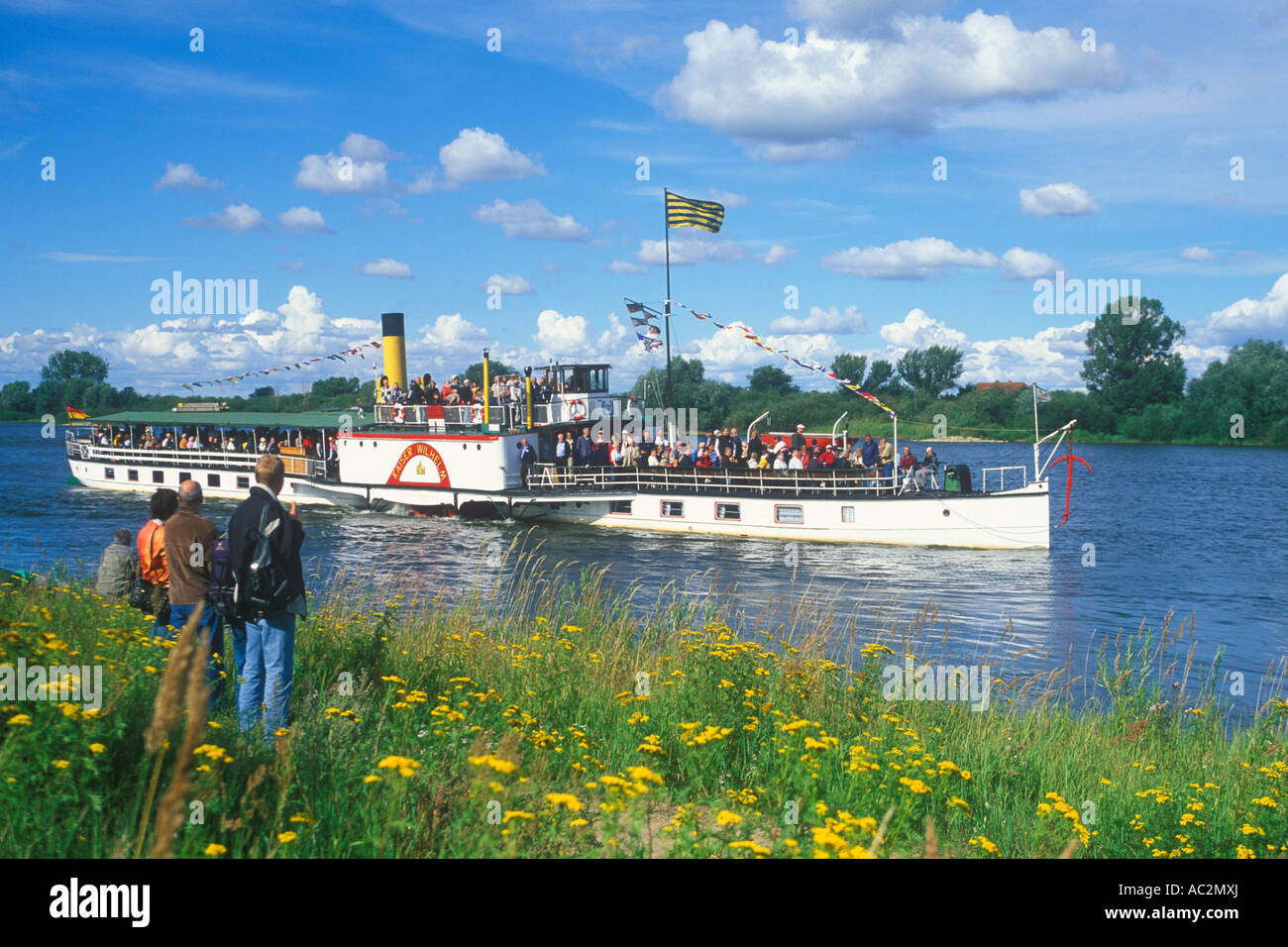 the paddlesteamer Kaiser Wilhelm arriving at Bleckede in Lower Saxony ...
