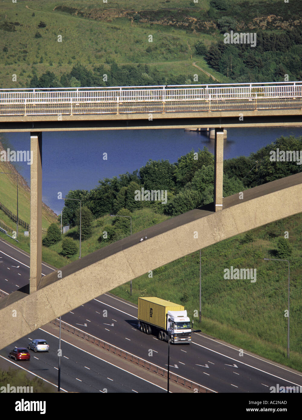 Truck passing under bridge High Resolution Stock Photography and Images ...