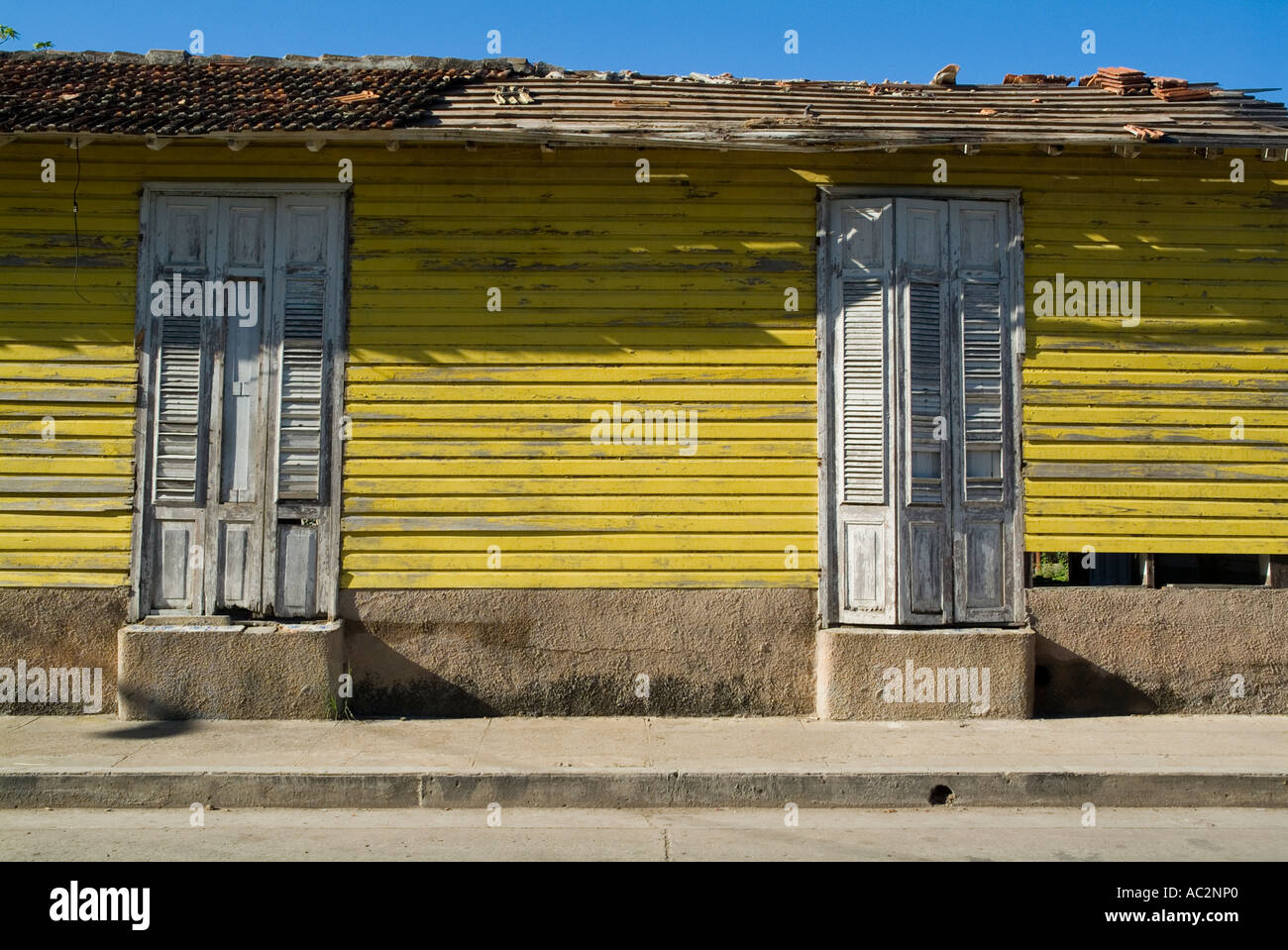 Run down wooden colonial house on Punta Gorda, Cienfuegos, Cuba Stock ...