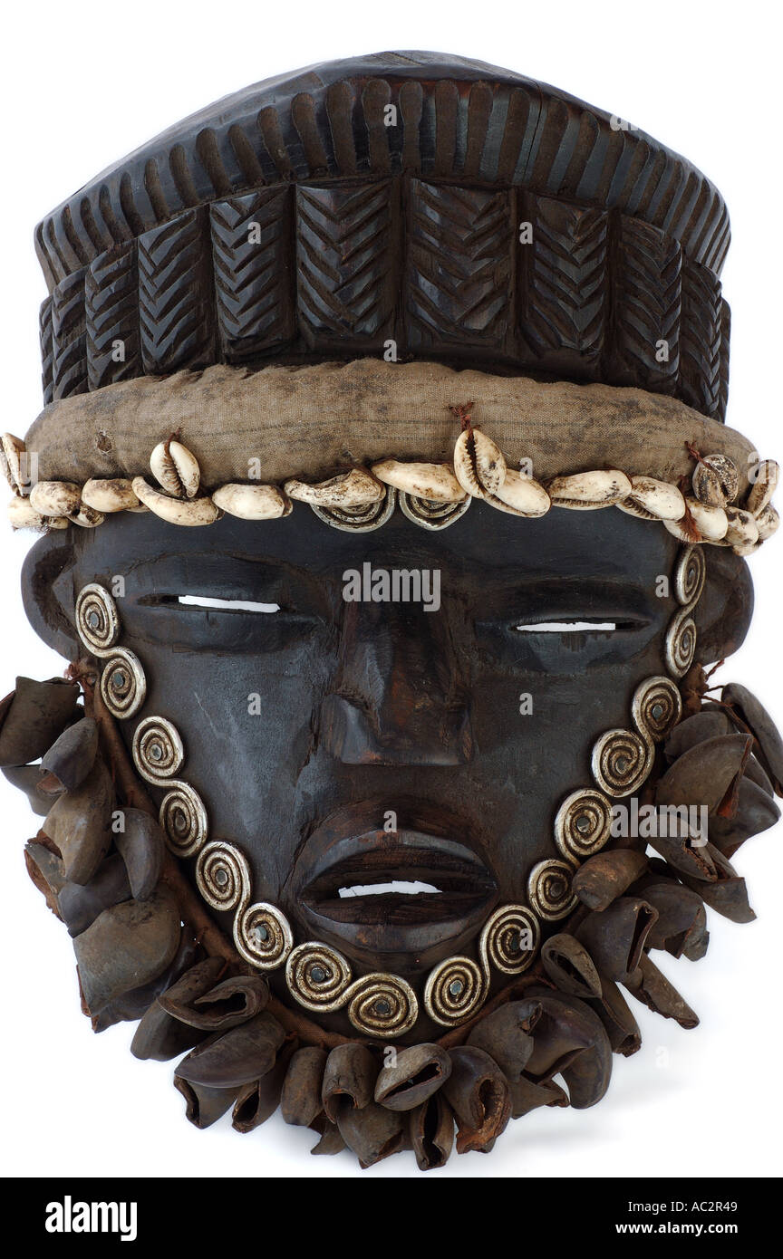 Hand made African mask with shell beard on white background Stock Photo ...