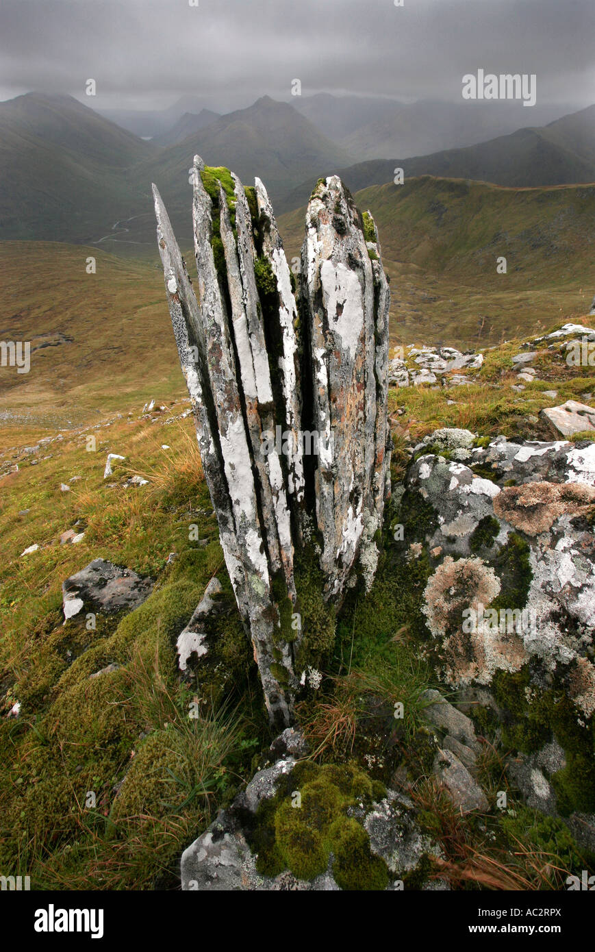 Flaked schist rock and mountain landscape in Glen Affric, Scotland ...