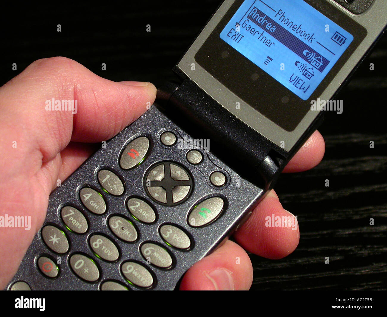 Man holding Cellphone making a call Stock Photo - Alamy
