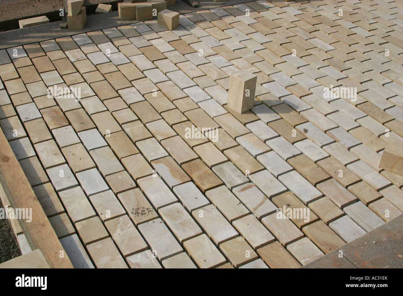 Brick paving blocks in position ready for finishing Stock Photo - Alamy